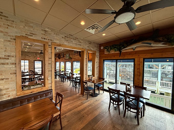 Inside, exposed brick meets wooden warmth in a dining room that says "stay awhile" without having to shout it.