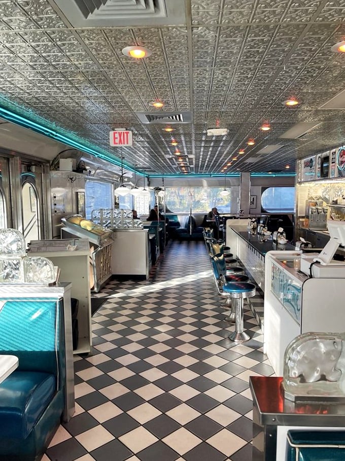 Classic Americana in every detail—from the pressed tin ceiling to the turquoise vinyl booths. This isn't decoration; it's a love letter to the golden age of diners.