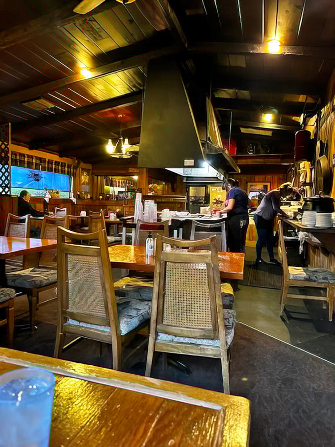 Wooden beams, warm lighting, and an open kitchen create the perfect rustic atmosphere. This isn't Instagram-engineered coziness—it's the real deal.