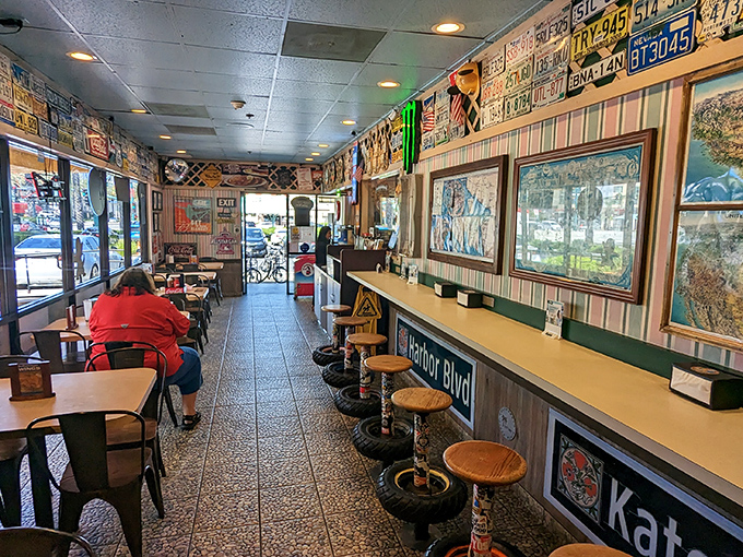 Where nostalgia meets gastronomy. License plates line the walls while tire-based stools invite you to pull up and stay awhile.