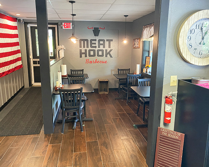 Inside, simplicity reigns supreme. No distractions from the main event—just you, those wooden tables, and the anticipation of smoky perfection.