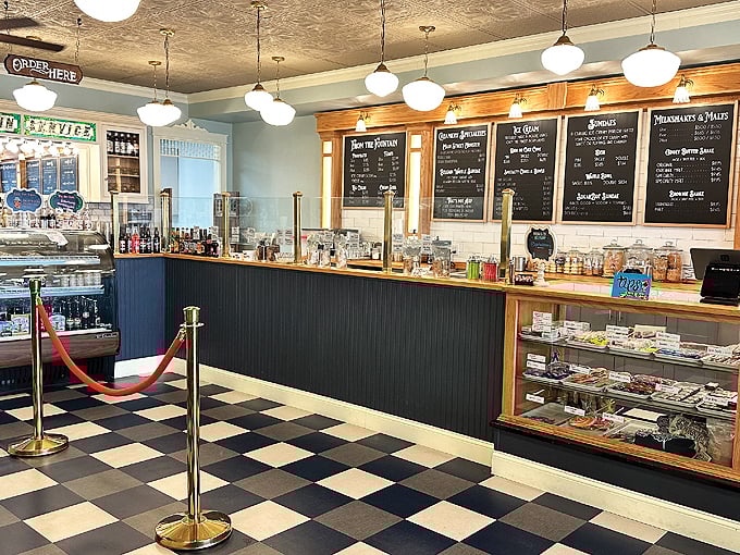 Step back in time with that iconic checkerboard floor and gleaming counter – this isn't just a soda shop, it's a portal to simpler, sweeter days.
