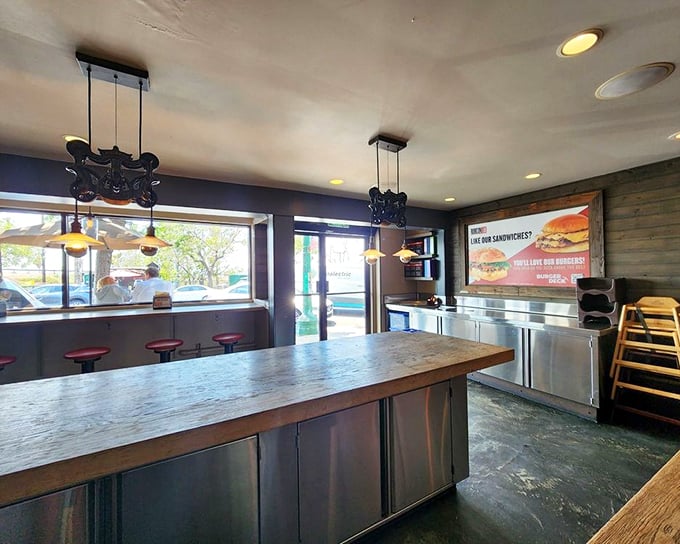 Industrial-chic meets sandwich paradise. The wooden counter isn't just functional—it's where bread-based dreams come true.