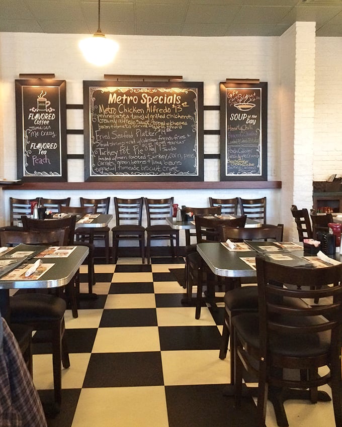 Classic black and white checkered floors meet handwritten chalkboard menus – this isn't retro-styled, folks, it's the real nostalgic deal that time forgot.