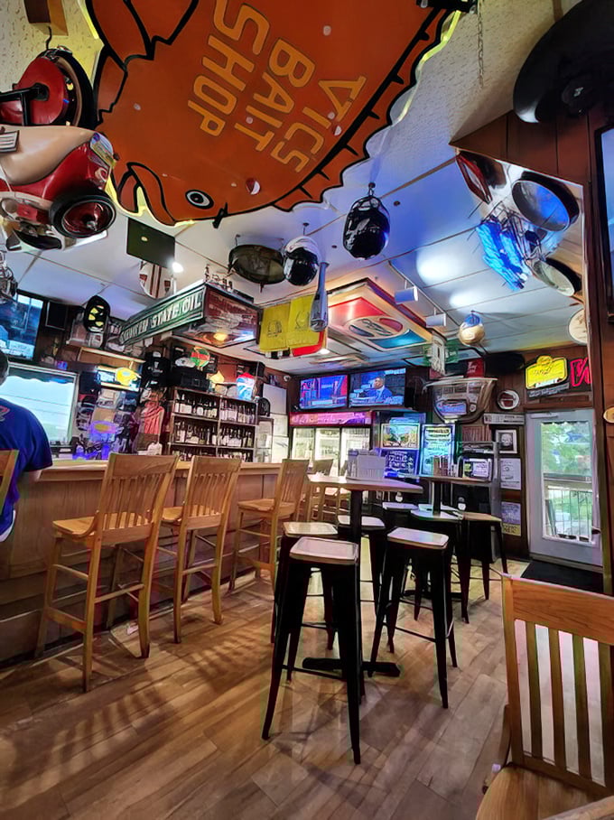 Where every inch tells a story – the ceiling adorned with memorabilia speaks volumes about decades of good times and even better food.
