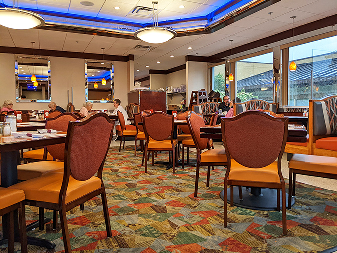 Cozy booths, warm lighting, and that signature blue ceiling glow—this isn't just a diner, it's Delaware's living room where strangers become neighbors. 