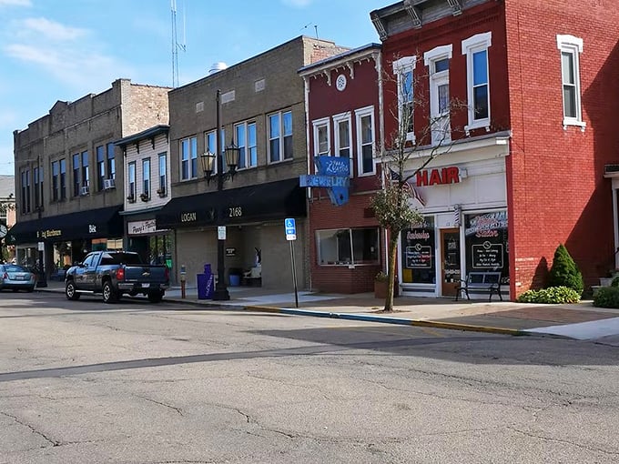 Main Street's historic brick buildings stand as silent witnesses to generations of Logan residents, each with stories etched in their weathered facades.