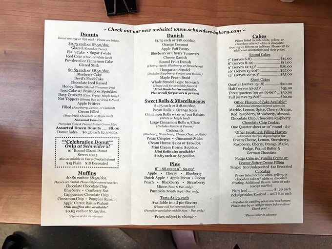 The menu at Schneider's reads like a sweet tooth's bucket list. Notice how "Celebration Donuts" get their own special box? That's not a coincidence, folks.