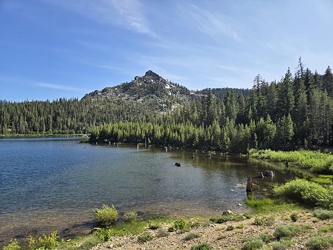 Mountain majesty that doesn't require oxygen tanks to enjoy. This pristine lake reflects the rugged peak like nature's own Instagram filter.
