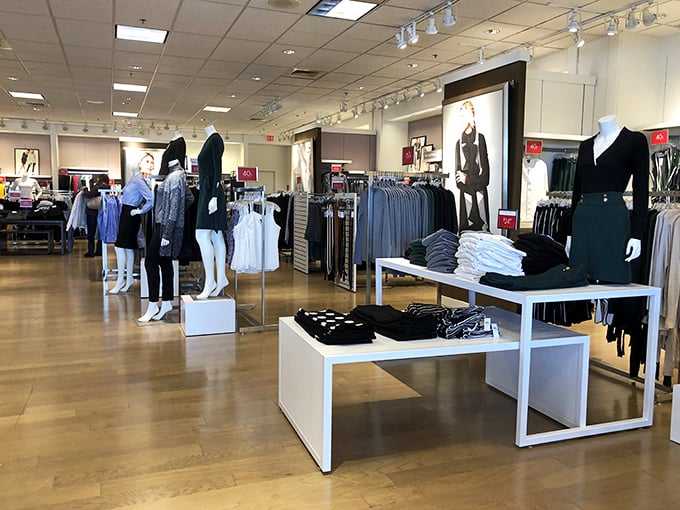 Clean, bright displays make even outlet shopping feel like browsing a high-end boutique experience.
