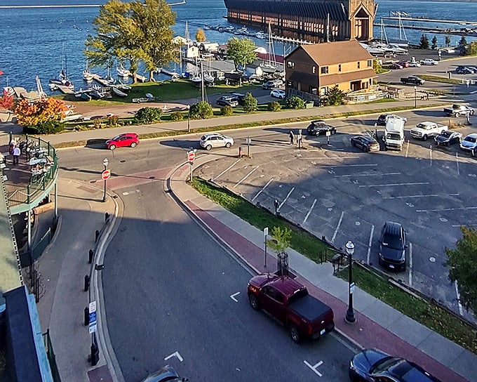 Lake Superior's harbor view showcases Marquette's maritime heart, where sailboats bob peacefully against a backdrop of the iconic ore dock structure.