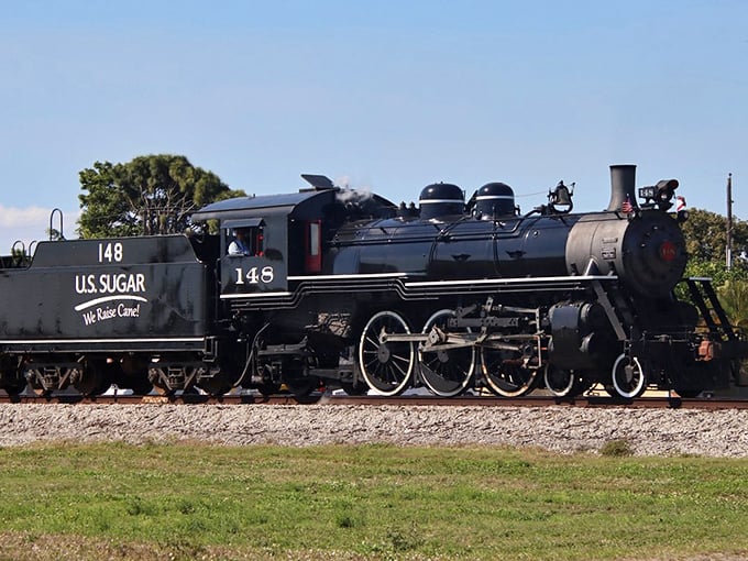 Engine No. 148 stands proud in the Florida sunshine, its black and yellow livery a testament to industrial elegance from a bygone era.