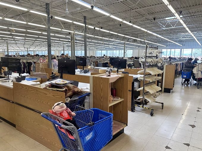 Endless racks stretch toward the horizon like a fashion frontier. Here, every aisle promises the thrill of discovery for patient treasure hunters.