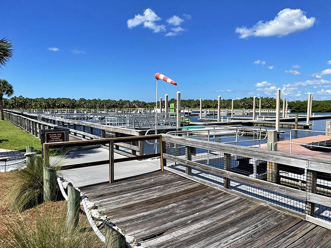 The marina welcomes boaters with open arms and sturdy slips. That wind sock isn't just decorative—it's nature's way of saying "perfect day ahead!"