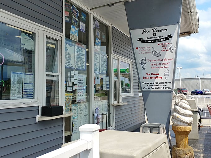 That iconic takeout window—where summer dreams are handed over in paper-wrapped packages and waffle cones, unchanged since the Eisenhower administration. 