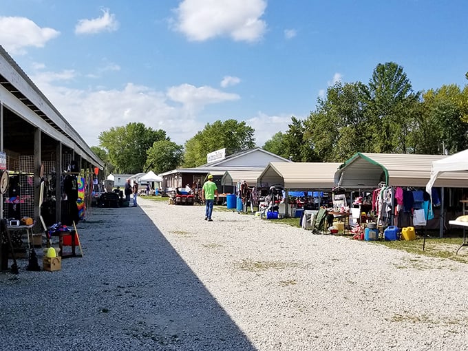 Rows of possibility stretch into the distance. Each covered stall holds someone's past waiting to become part of your future.