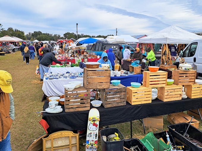 The real magic happens at eye level, where wooden crates transform into rustic display cases showcasing everything from vintage dishware to childhood memories.