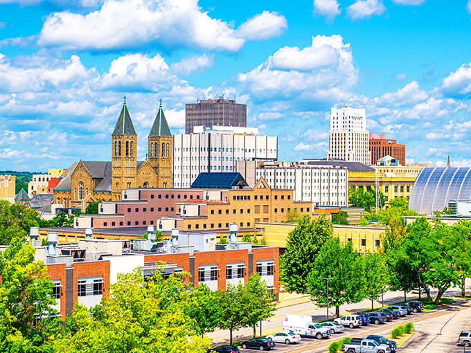 Akron's colorful skyline stands proud against a perfect Ohio sky. Those twin church spires have witnessed generations of rubber workers and budget-conscious dreamers.