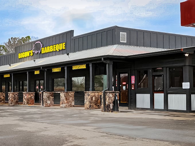 Bold yellow letters announce what your nose already knows—serious barbecue happens here. No fancy frills, just meat thrills.