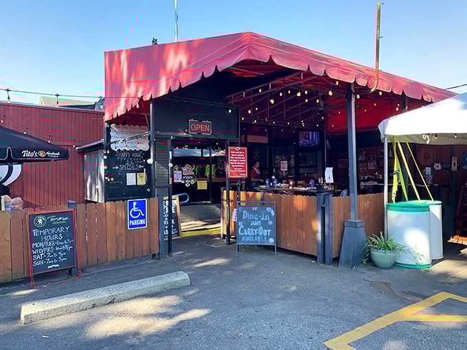 Open-air dining meets old-school charm under this cheerful red awning - it's like eating at America's favorite backyard barbecue.