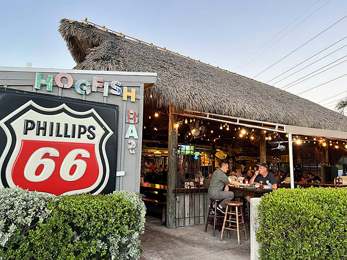 Under that thatched roof, magic happens – the kind involving fresh hogfish and cold beer.