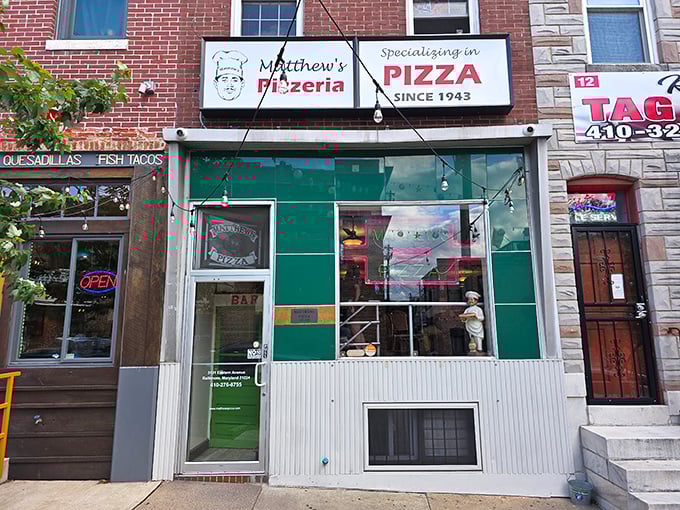 Matthew's Pizzeria's modest storefront hides Baltimore's pizza royalty – like finding a Picasso in your grandma's attic. 