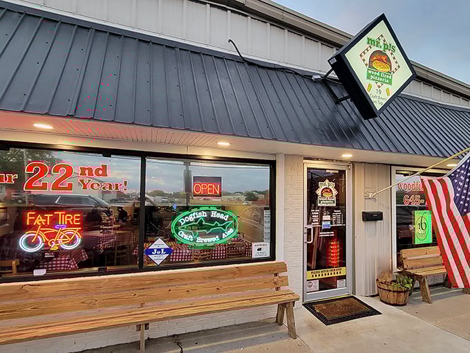 Mr. P's celebrates 22 years of pizza magic with a cheerful storefront. That Fat Tire sign isn't lying—you'll need exercise after these pies!