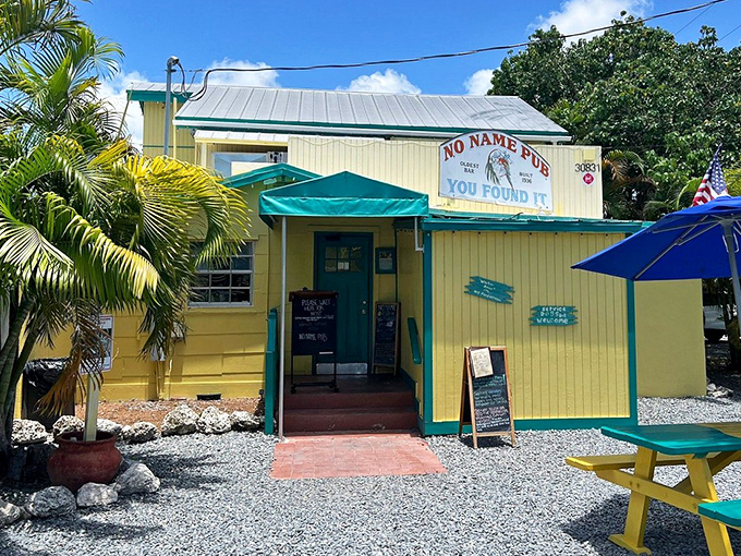 That bright yellow building isn't trying to hide – No Name Pub wears its quirky personality like a badge of honor.
