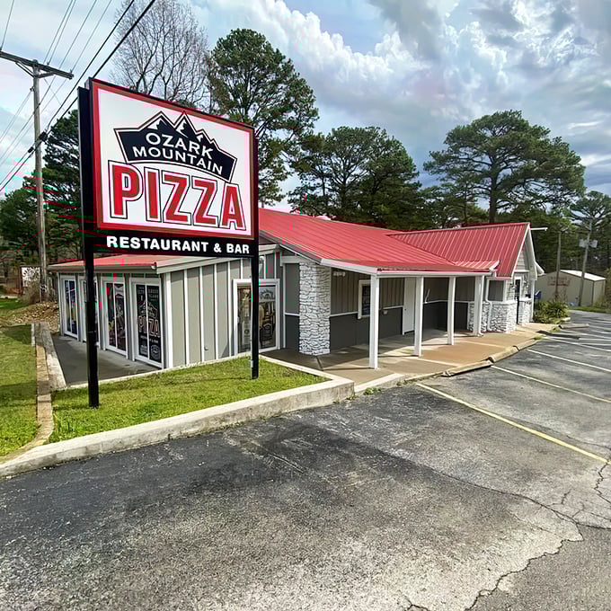 Ozark Mountain Pizza's rustic charm and bright red roof make it the perfect hideaway after a day of Branson's sequined spectacles.