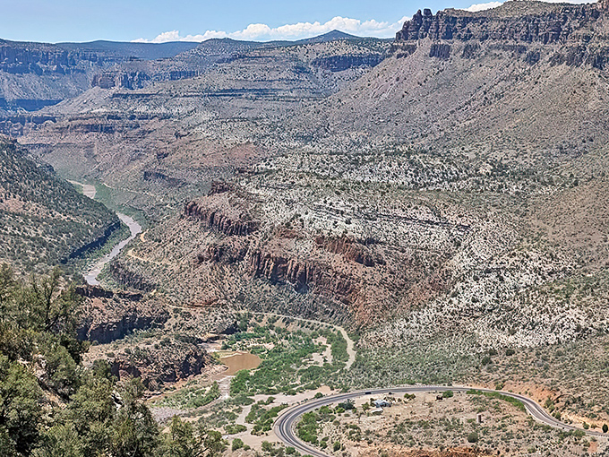 Salt River Canyon unfolds below like Earth's own Grand Canyon tribute band – less famous but playing all the same breathtaking hits.