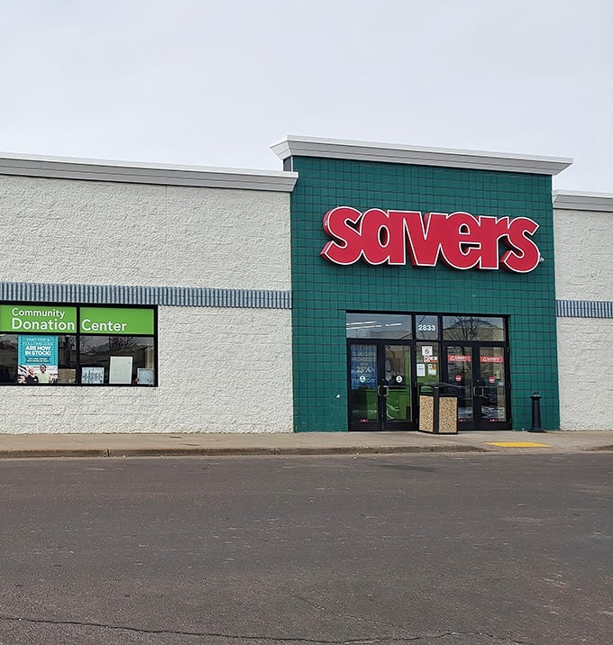 The bold red Savers sign promises a treasure hunt that might just fill your car trunk with unexpected finds.