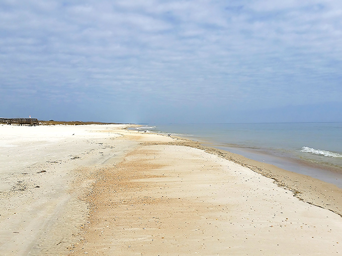 Miles of untouched shoreline at St. George Island Beach. No high-rises, no crowds—just you and that impossibly blue water.