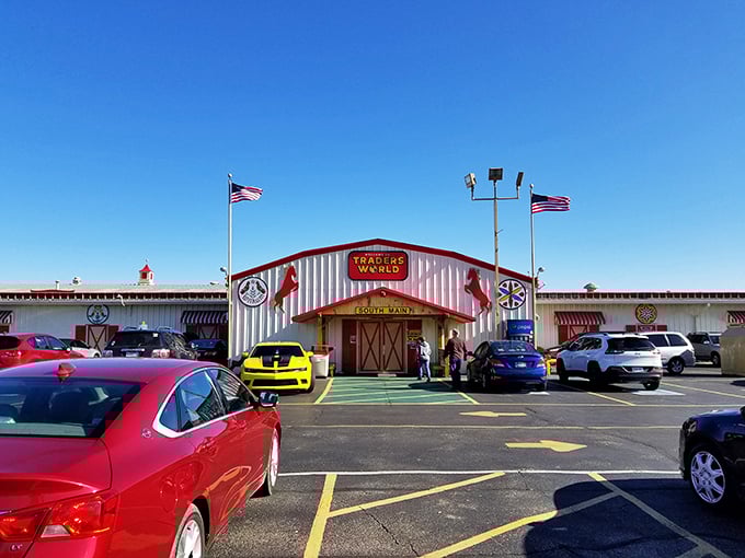 Traders World's barn-red entrance isn't just a door—it's a portal to a universe where every aisle tells a different story.
