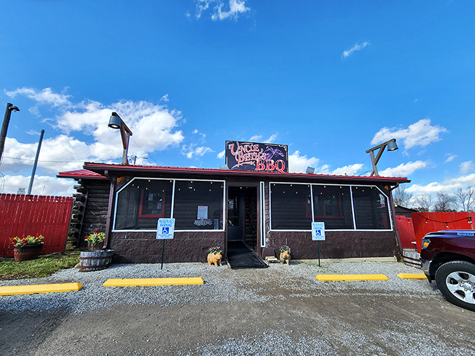 Uncle Beth's BBQ's rustic cabin charm comes with a side of adorable dog statues – guardians of the smoky treasures within.