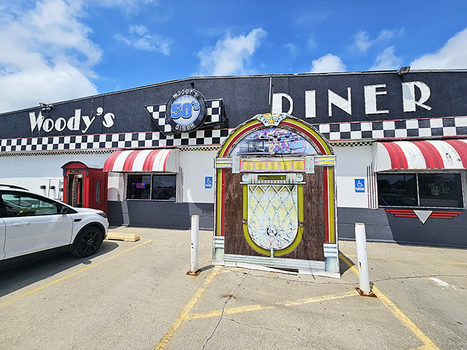 Woody's 50's Diner flaunts its nostalgic charm with that jukebox entrance—Elvis would approve of this time capsule.