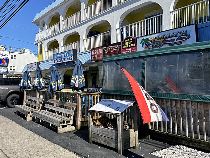 Woody's Beach Things sits beneath yellow arches like a seafood speakeasy – where crab cakes are the password to culinary bliss.