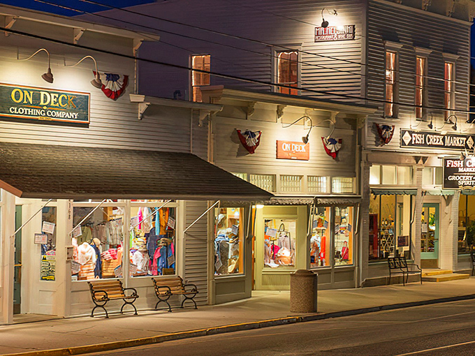 Evening lights twinkle along Fish Creek's main drag, where shops selling everything from fudge to fine art welcome browsers who've left their watches at home.