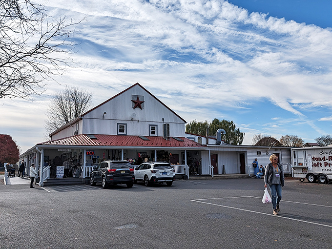 That red roof and white siding aren't just charming—they're housing some of the most authentic shoofly pie this side of Lancaster County!