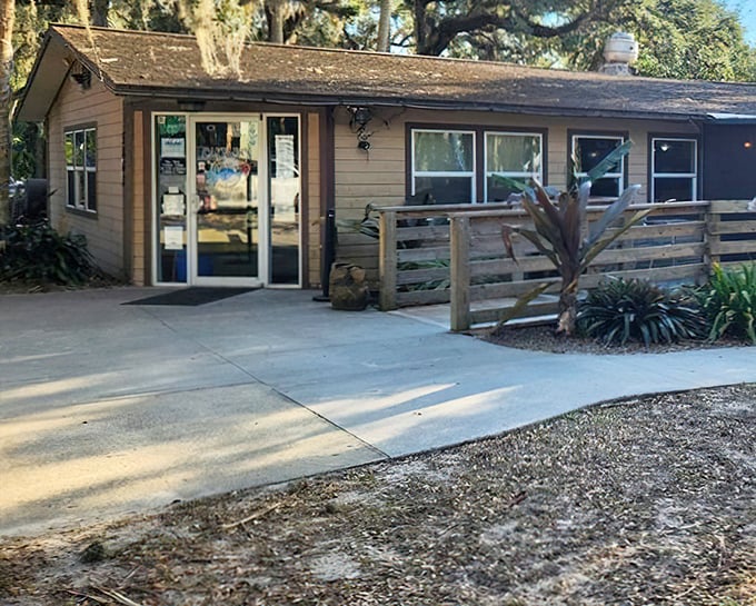 The simple wooden entrance to Captain's BBQ feels like walking into a friend's backyard cookout – if your friend happened to be a barbecue master.