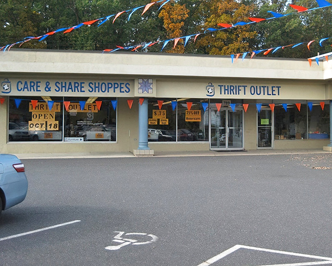 Those colorful pennants aren't just decoration—they're celebrating another day of incredible finds at Care & Share Shoppes.