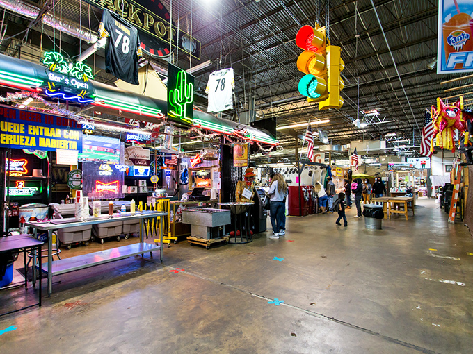 Neon signs light the way at Cooks Flea Market, like Vegas for bargain hunters without the gambling (unless you count vintage electronics).