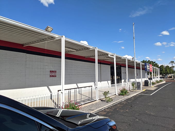 Colorful flags flutter above this thrifting mecca, promising a carnival of secondhand delights inside.