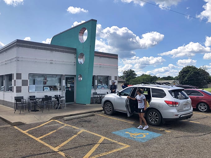 The checkerboard exterior isn't just decoration—it's Doug's way of saying "checkmate" to boring modern fast food joints.