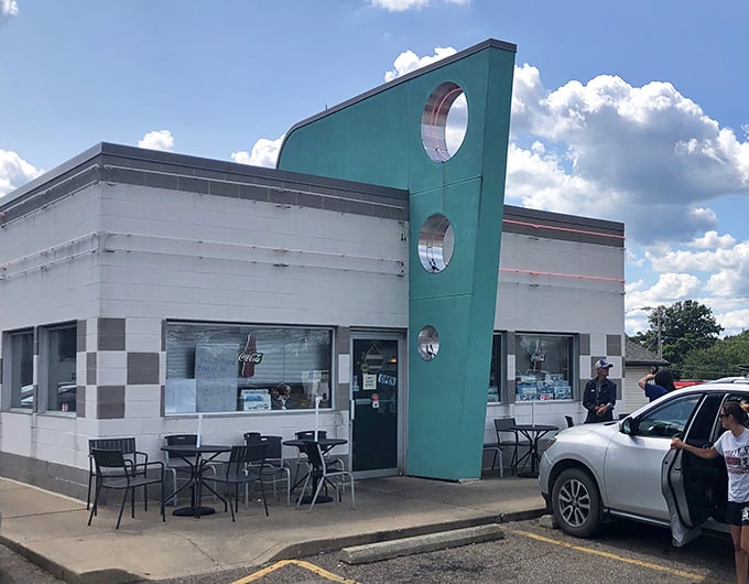 Those circular windows at Doug's aren't just design elements – they're portals to a time when "fast food" meant made-to-order, not mass-produced.