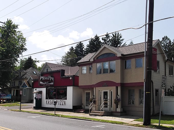 Kasas Pizza and cozy homes line the street—East Stroudsburg serves up hometown warmth with a slice of local flavor.