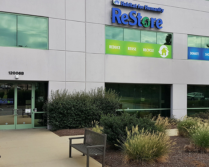 ReStore's clean, modern facade houses a wonderland of home goods. "Reduce, Reuse, Recycle" isn't just a slogan—it's a shopping strategy!