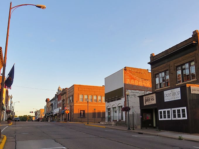 As dusk paints Neillsville, the town settles into a quiet beauty. This street practically whispers tales of yesteryear, truly captivating.