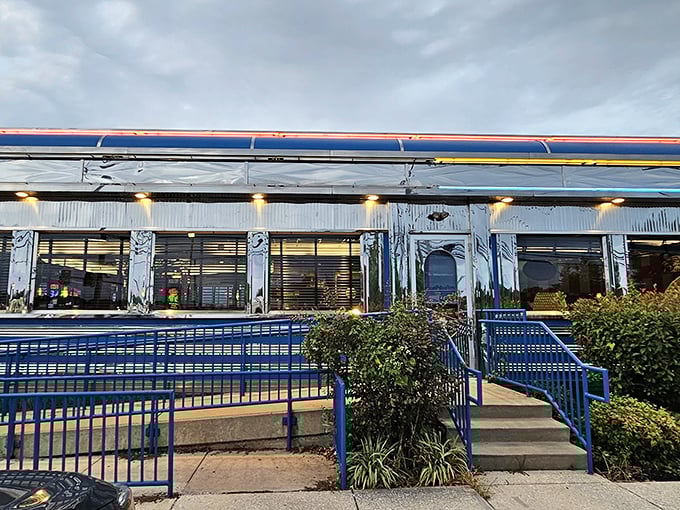 Silver Moon Diner (exterior): "Shiny on the outside, warm on the inside—just like the perfect grilled cheese sandwich you'll find on their menu."