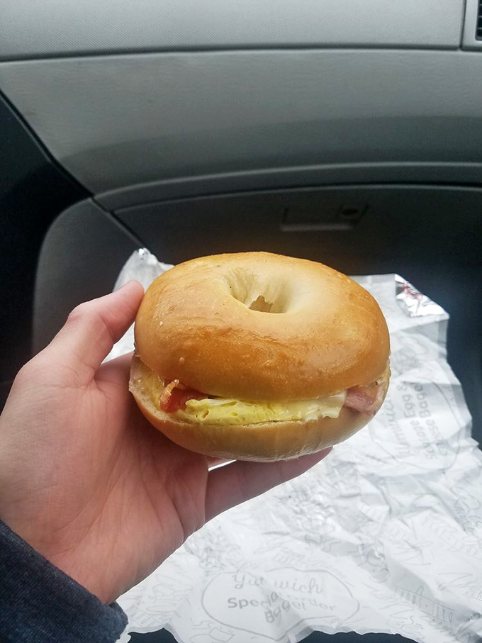 The breakfast sandwich that launched a thousand morning commutes—perfectly balanced egg, meat and cheese nestled in a fresh-baked bagel.
