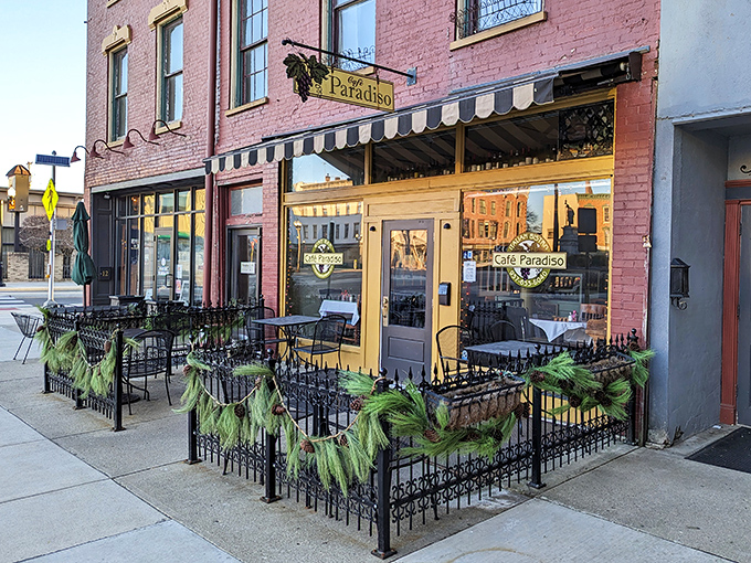 Café Paradiso's inviting patio practically whispers, "Stay awhile." The pink brick exterior houses coffee strong enough to power your entire retirement adventure.